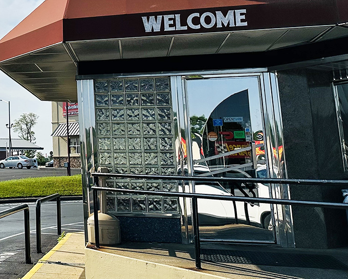 The iconic burgundy awning and glass block windows of Suburban Diner stand like a time portal to when calories didn't count and coffee refills were unlimited.