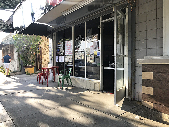 The unassuming storefront of El Huarache Azteca beckons from York Boulevard, promising authentic flavors behind its modest exterior.