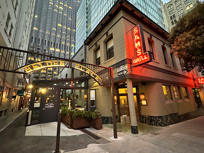 Sam's Grill stands like a time capsule amid San Francisco's skyscrapers, its neon sign a beacon for seafood lovers since long before Instagram existed.