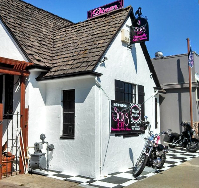 A little white diner with pink neon signage and a motorcycle parked outside – Sax's Joint is the breakfast equivalent of finding a $20 bill in your winter coat.
