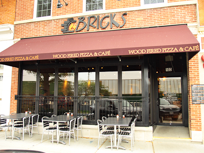 The unassuming storefront of Bricks Wood Fired Pizza in Wheaton hides culinary magic within, like finding a Ferrari engine in a station wagon.