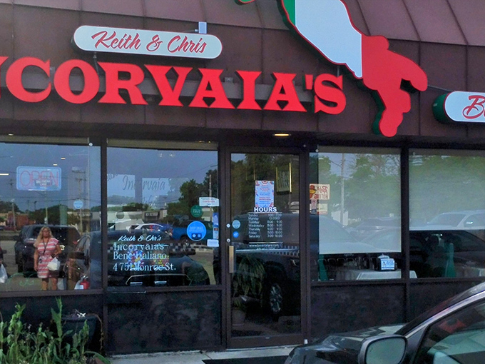 The iconic red signage of Incorvaia's Bene Italiano stands as a beacon for hungry Toledoans, promising authentic Italian comfort in an unassuming strip mall setting.