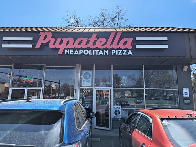 The bright yellow awning beckons like a pizza lighthouse on Wilson Boulevard. No fancy frills needed when what's inside is this good. 
