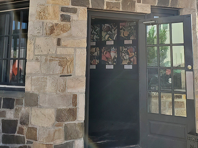 The stone facade of Bridgets Steakhouse stands like a culinary fortress in Ambler, promising treasures within that the modest exterior only hints at.