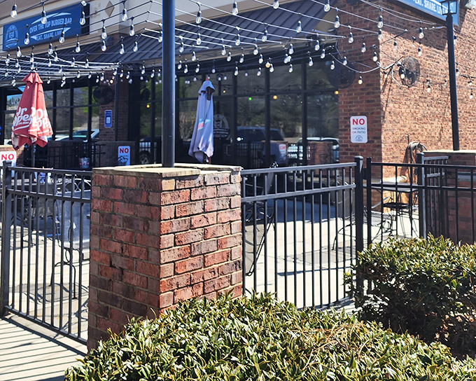 The unassuming storefront of Over The Top Burger Bar hides culinary madness within. Like finding a Ferrari engine in a station wagon.