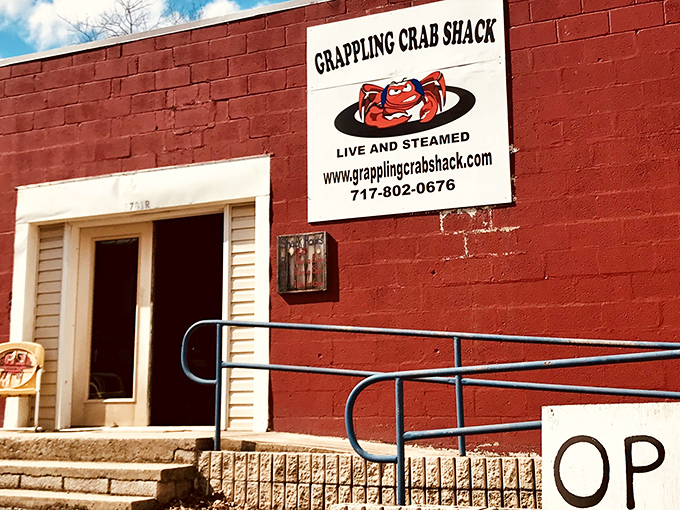 The unassuming red brick exterior that houses seafood greatness&mdash;proof that culinary treasures often hide behind the simplest facades.