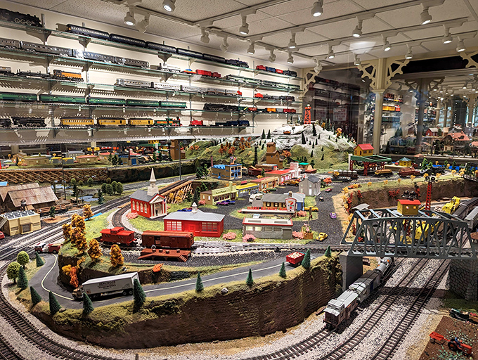 The grand entrance to the National Toy Train Museum stands like a Victorian train station, promising adventures in miniature just beyond those glass doors.