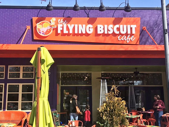The purple building with its vibrant orange awning isn't just a restaurant&mdash;it's a morning beacon calling breakfast enthusiasts home.