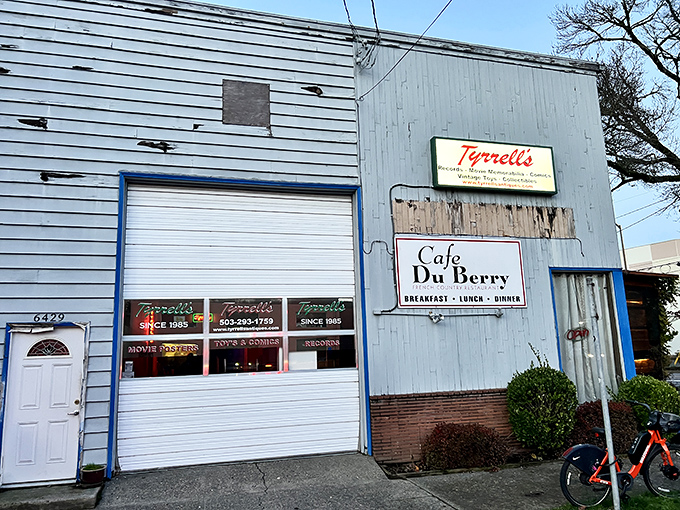 The unassuming blue and white exterior of Cafe Du Berry stands like a culinary speakeasy, hiding breakfast treasures behind its modest facade.