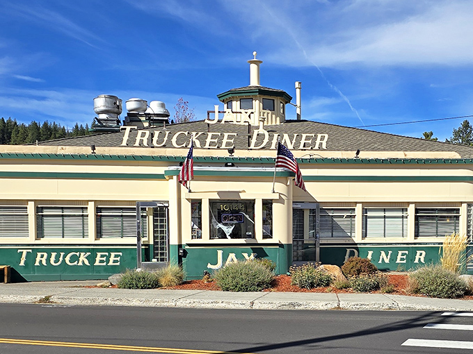 The classic green and cream exterior of Jax at the Tracks stands proudly in Truckee, where time slows down and appetites ramp up.