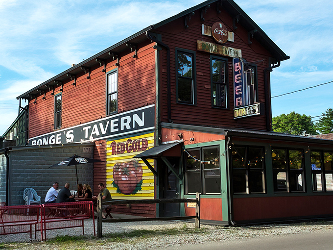 The unassuming red exterior of Bonge's Tavern stands like a culinary lighthouse in rural Indiana, beckoning hungry pilgrims to its legendary prime rib sanctuary.