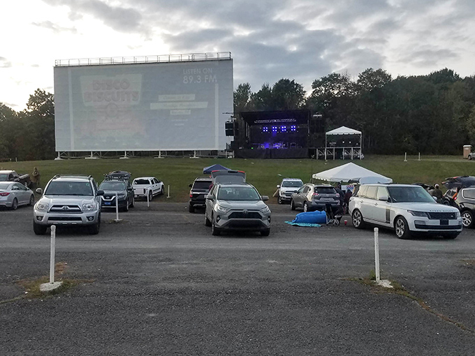 The magic hour at Circle Drive-In, when cars gather like faithful pilgrims and the screen awaits its nightly transformation into a portal to other worlds.