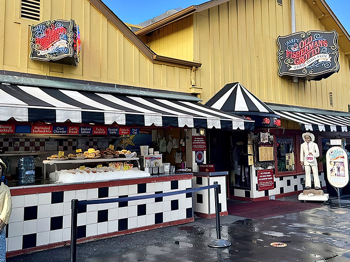 The cheerful yellow exterior with its jaunty black and white awnings stands like a maritime sentinel on Fisherman's Wharf, beckoning hungry travelers with promises of seafood treasures.