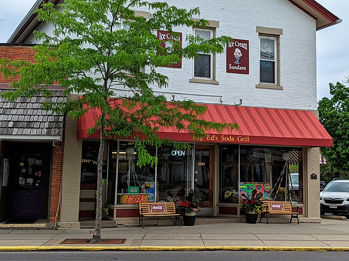 The classic white brick fa&ccedil;ade with its cherry-red awning isn't trying to be retro&mdash;it's the real deal that's been serving Vermilion memories for generations.