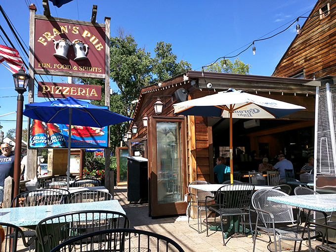 The wooden facade of Fran's Pub stands like a culinary lighthouse in New Hope, beckoning hungry travelers with promises of comfort and satisfaction.