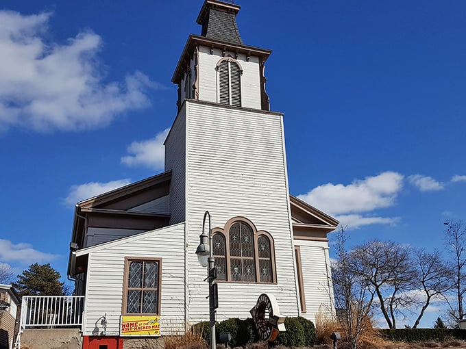 The heavenly conversion is complete! This former church now preaches the gospel of great food, with its iconic steeple standing sentinel over culinary salvation.