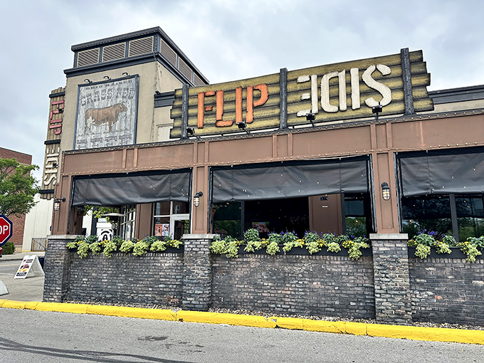 Industrial chic meets comfort food paradise where exposed brick and Edison bulbs create dining magic.
