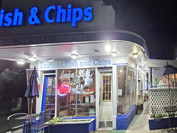 The blue-trimmed facade of Tugboat Fish & Chips stands out like a cheerful maritime beacon in Carmichael. No pretense, just the promise of seafood perfection.
