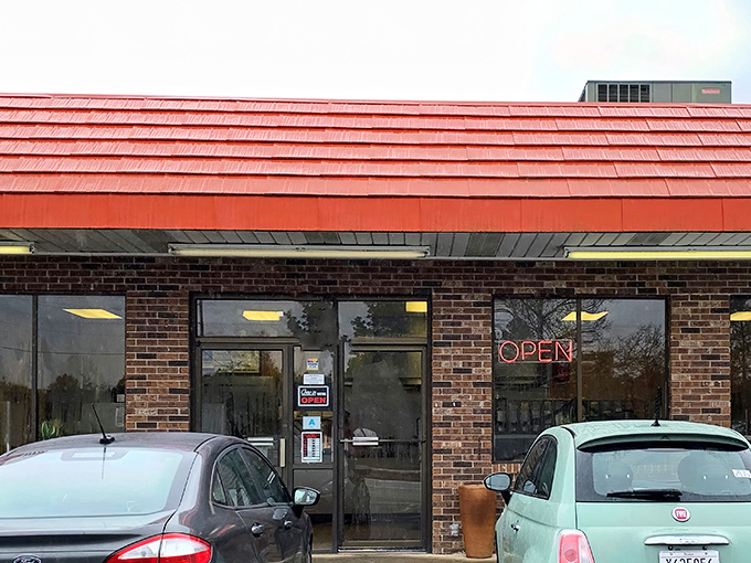 The unassuming brick exterior with its signature orange-red roof has been Florence's best-kept culinary secret for decades. No Instagram filters needed here&mdash;just honest food and community.