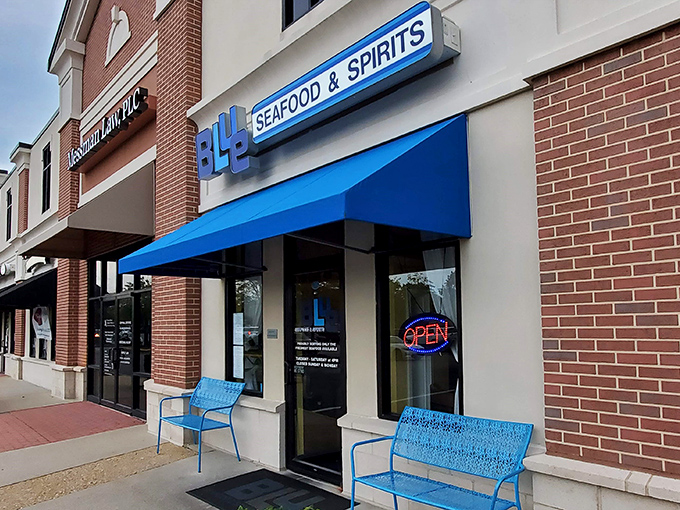 The blue awning beckons like a maritime flag signaling "fresh seafood ahead." This unassuming storefront houses treasures from the deep.