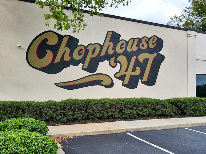 The exterior beckons with twinkling lights wrapped around trees, promising an evening of culinary delight that begins the moment you arrive.