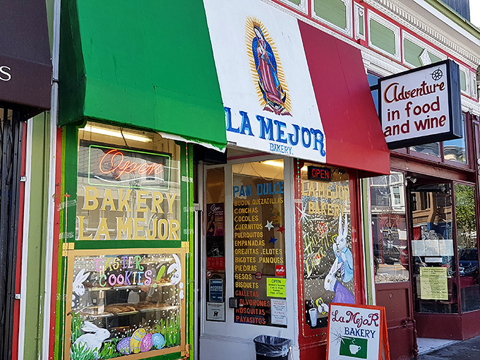 The vibrant red, white, and green fa&ccedil;ade of La Mejor Bakery stands as a colorful beacon of authentic Mexican pastries in San Francisco's Mission District.