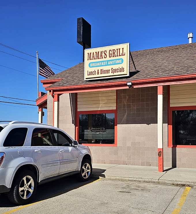 The unassuming exterior of Mama's Porch and Grill stands like a beacon of breakfast hope in Batavia, promising comfort food that'll make your cardiologist wince and your soul sing.