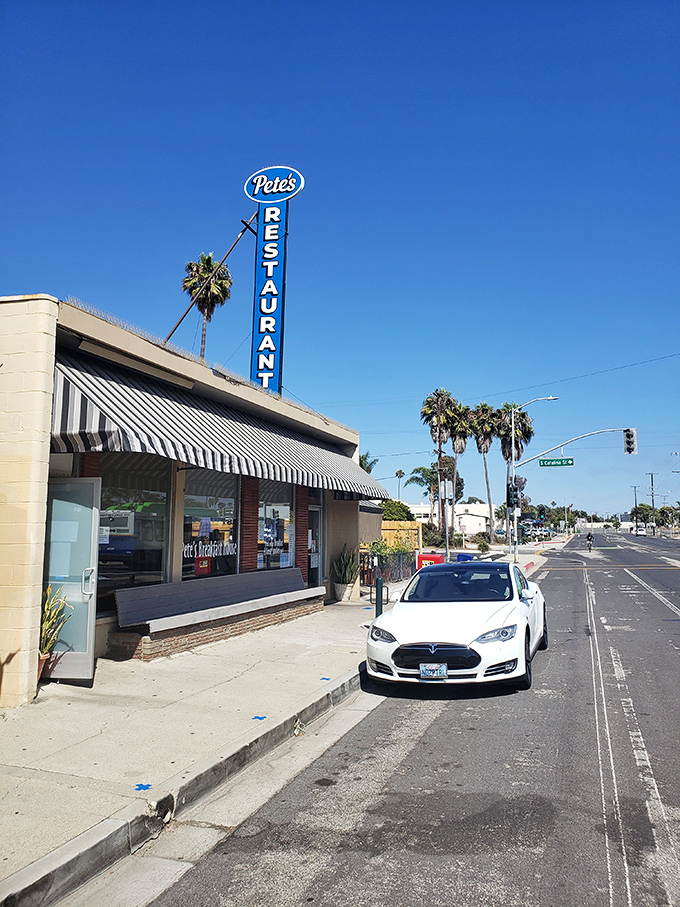 That towering blue sign isn't just advertising - it's a beacon calling hungry souls to breakfast paradise.