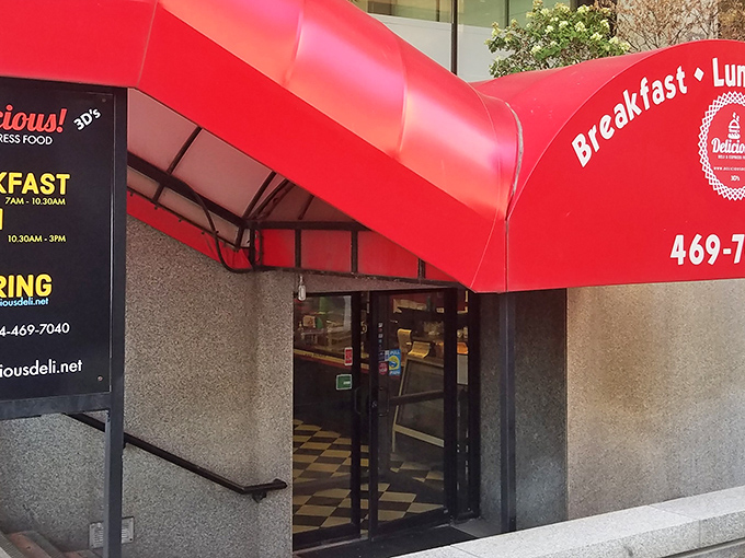 That iconic red awning isn't just a splash of color—it's a beacon for sandwich lovers throughout Columbus, promising deli salvation within.
