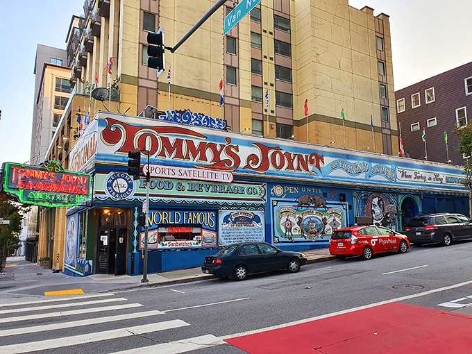 Tommy's Joynt stands like a technicolor fever dream on Van Ness Avenue, a vibrant hofbrau oasis in San Francisco's urban landscape.