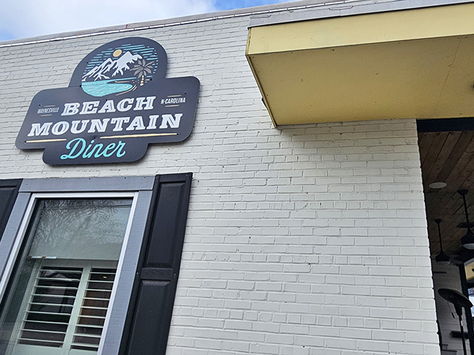 The white brick exterior with its cheerful yellow accents makes Beach Mountain Diner look like the breakfast equivalent of finding a $20 bill in your winter coat.