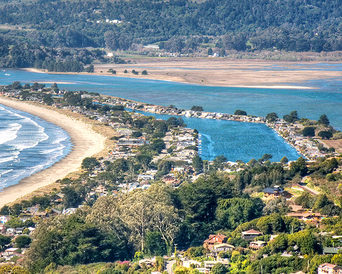 Stinson Beach stretches like nature's perfect smile along the California coast, with Mount Tam standing guard over this slice of paradise.