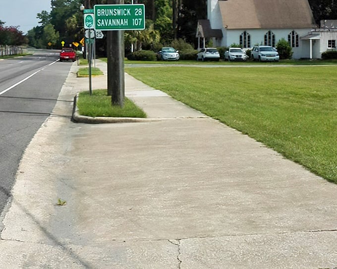 Highway signs pointing to Brunswick and Savannah &ndash; the perfect roadmap for your coastal Georgia adventure where small-town treasures await between big-city destinations.