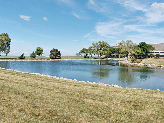 Sunset transforms Caesar Creek Lake into nature's mirror, reflecting golden skies and peaceful solitude. The perfect end to a day of outdoor adventures.