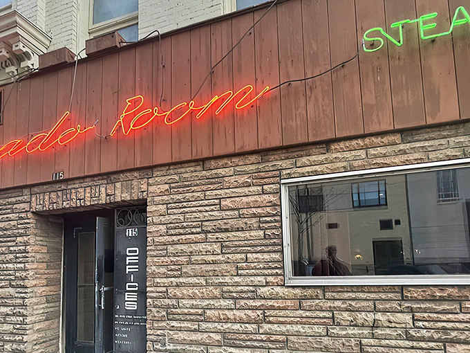 The neon glow of Tornado's sign cuts through Madison's evening air like a beacon for carnivores seeking refuge from ordinary dining experiences.