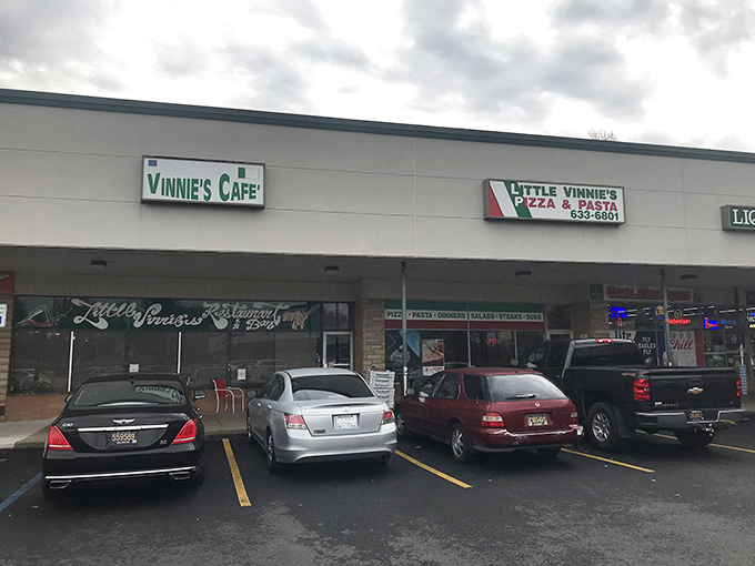 The unassuming storefront of Little Vinnie's might not stop traffic, but locals know this modest exterior hides Delaware's best-kept culinary secret.