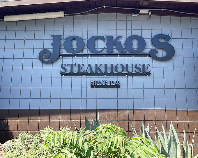 The unassuming exterior of Jocko's promises no frills, just thrills for your taste buds. Those wine barrels aren't just for show&mdash;they're foreshadowing the flavor journey ahead.
