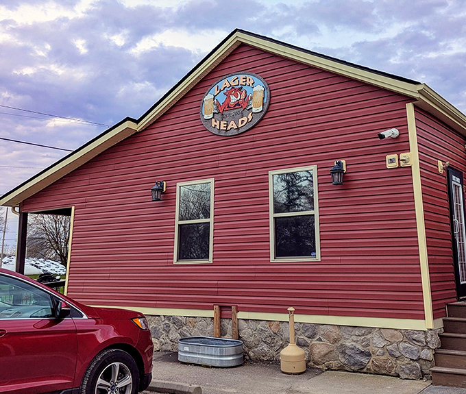That red barn exterior might fool you, but inside lies barbecue magic that'll change your perspective forever.