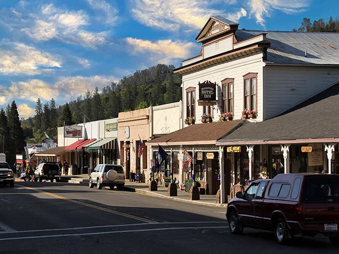 Main Street Mariposa looks like a movie set where the extras actually live. Historic buildings frame mountain views that make rush hour feel like a scenic drive.