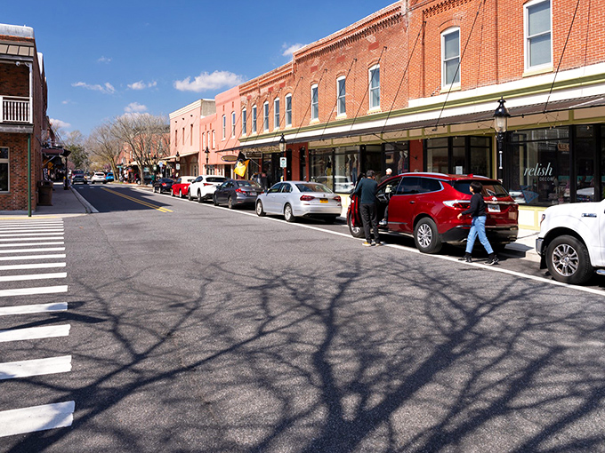 Main Street magic at its finest. These historic brick storefronts aren't just preserved&mdash;they're alive with shops that would make Norman Rockwell reach for his paintbrush.