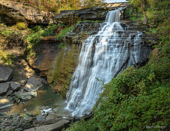 Nature's own masterpiece in motion, Brandywine Falls cascades 65 feet down layered rock formations, creating a mesmerizing display that hypnotizes visitors year-round.