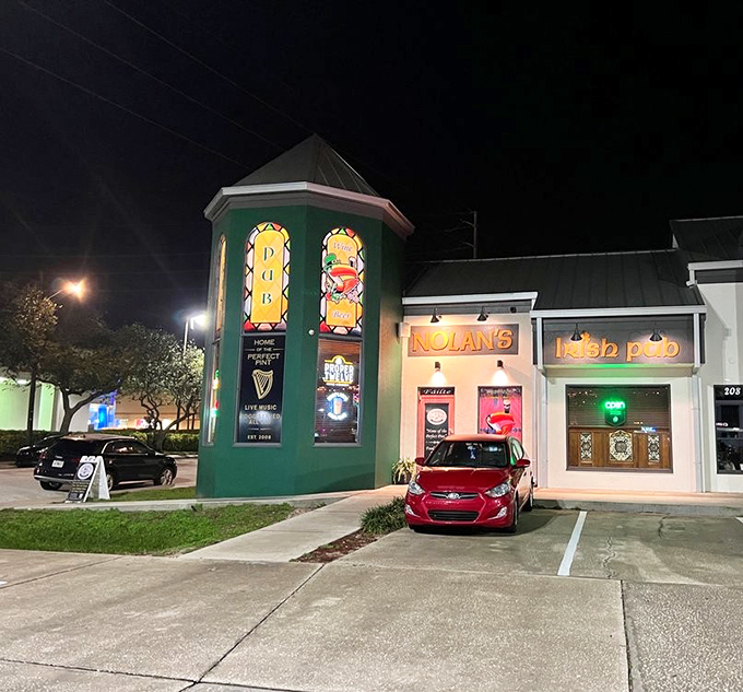 The emerald beacon of Nolan's Irish Pub glows against the Florida night, a Celtic oasis where astronauts and beach-goers alike find common ground over perfect pints.
