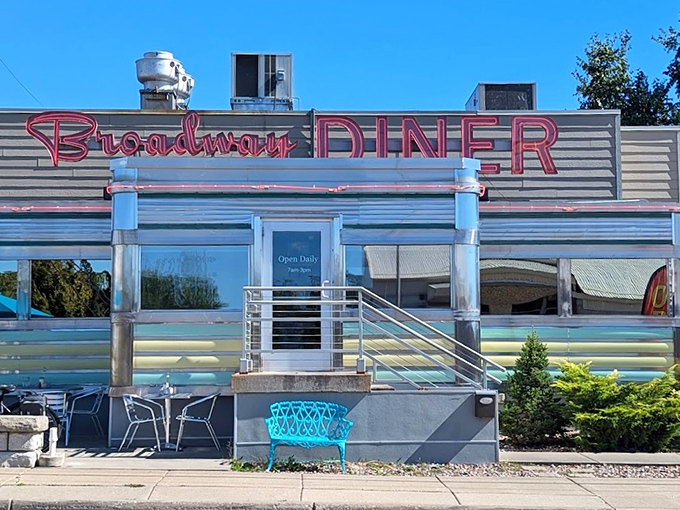 The gleaming stainless steel exterior of Broadway Diner stands like a time capsule in Baraboo, beckoning hungry travelers with its classic Americana charm.