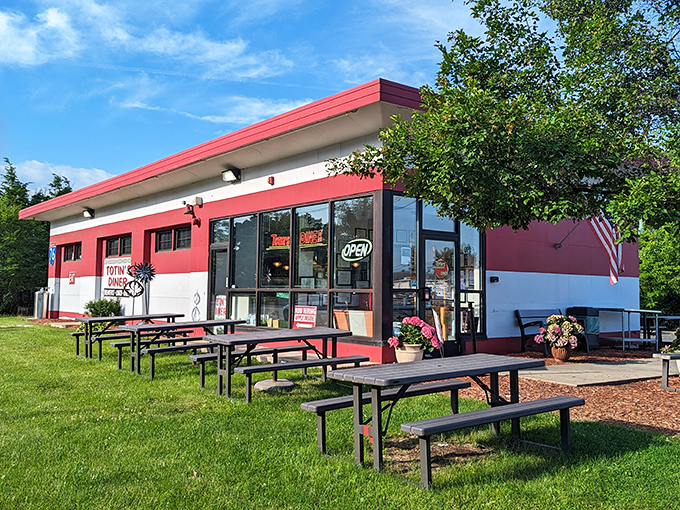 Classic red and glass facade promises comfort food adventures that'll make your taste buds sing hallelujah.