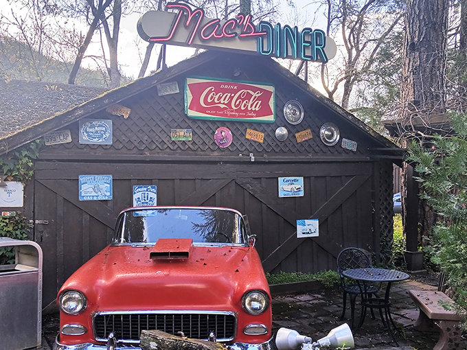 The time machine exists! Mac's vintage exterior with its classic red Chevy and nostalgic signage transports you to an era when diners were America's living rooms.