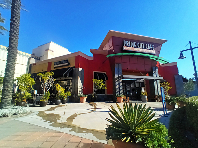 The vibrant exterior of Prime Cut Café stands like a culinary beacon in Orange, California, promising delicious adventures under that perfect blue sky.