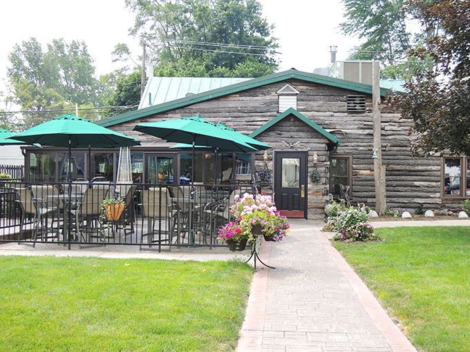The log cabin exterior of The Whitehouse Inn isn't trying to be rustic chic &ndash; it's the real deal, complete with a patio that beckons you to linger.