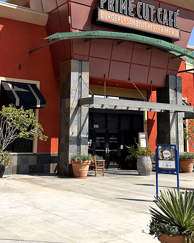 The terra cotta fa&ccedil;ade glows like a beacon for hungry souls, promising meaty salvation within those stylish doors. 