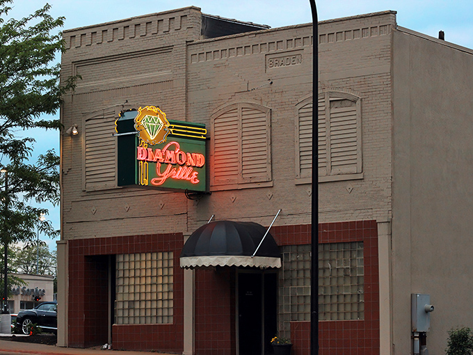 That neon diamond sign has been beckoning hungry Akronites for decades, like a culinary lighthouse guiding you to beefy treasures.