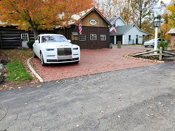 History stands proudly at the Spread Eagle Tavern, where the rustic log exterior and brick pathway whisper tales of stagecoach travelers and modern-day food pilgrims alike.